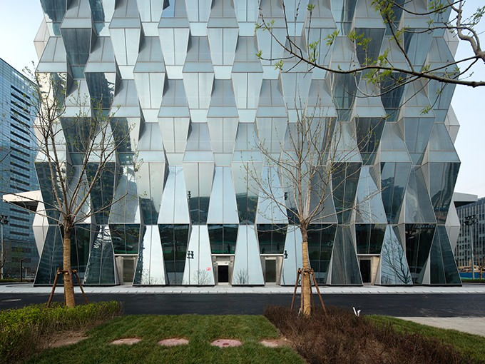 Trapezoidal Glass Panels Create Prismatic Facades for SOM's Beijing ...
